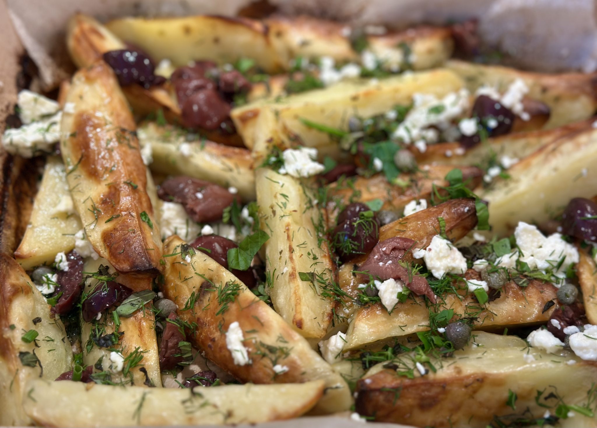 Irresistible Loaded Greek Potatoes with Feta, Herbs & Garlicky Yogurt ...